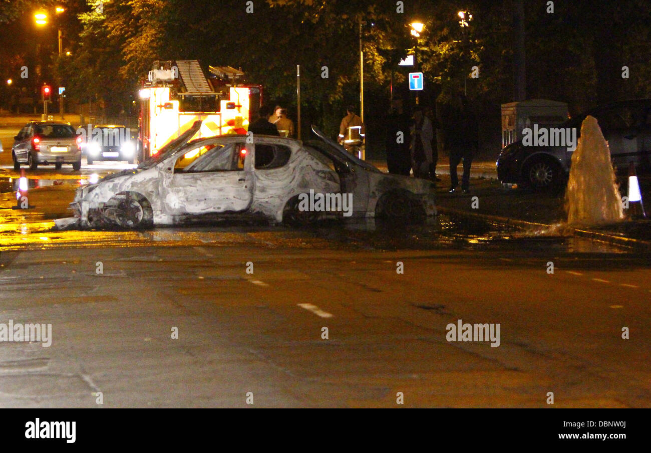 A burnt out car on Myrtle Parade after riots in Toxteth, Liverpool on ...