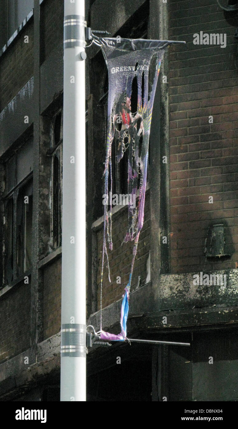Burnt flag The aftermath of rioting in Woolwich, England on August 8 ...