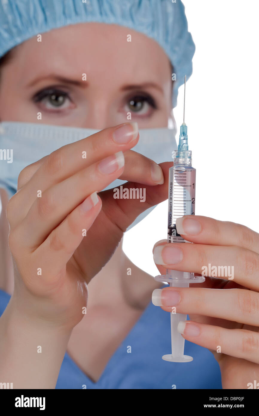 nurse holding medical syringe Stock Photo - Alamy