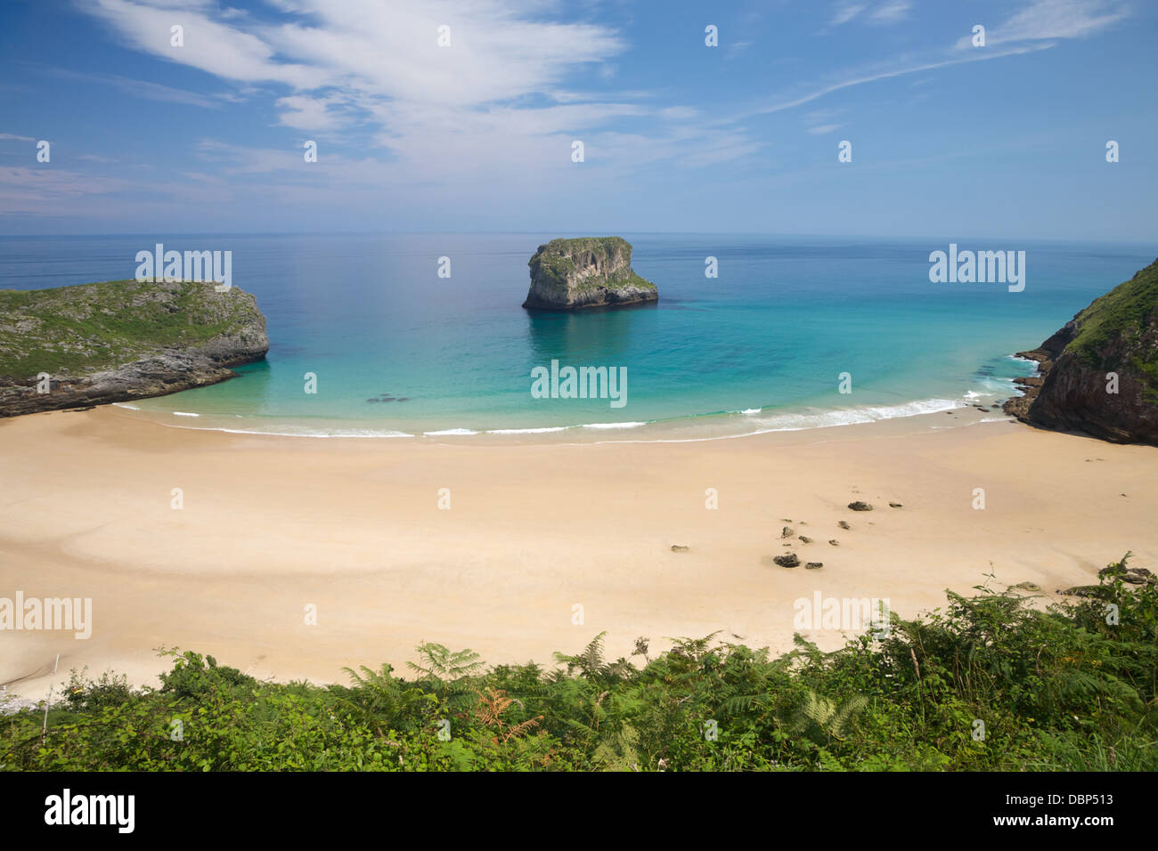 La Ballota beach with islet Stock Photo - Alamy