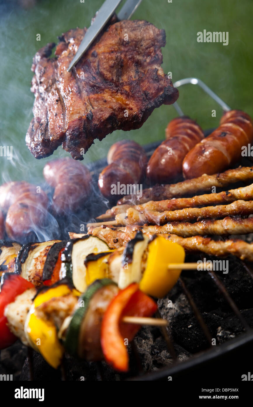 Barbecue a hot summer evening, Grilling Stock Photo - Alamy