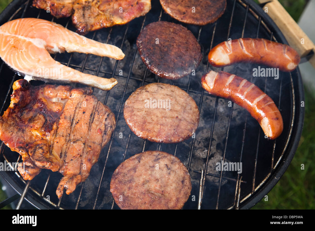 Barbecue a hot summer evening, Grilling Stock Photo - Alamy