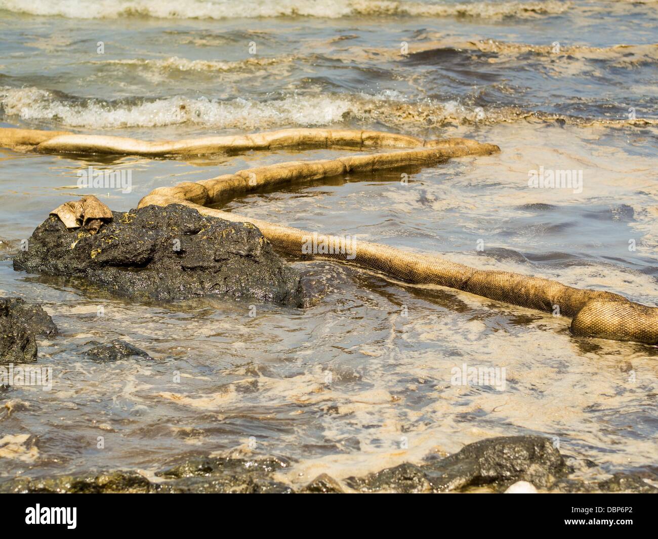 Koh Samet, Rayong, Thailand. 2nd Aug, 2013. A containment boom floats ...