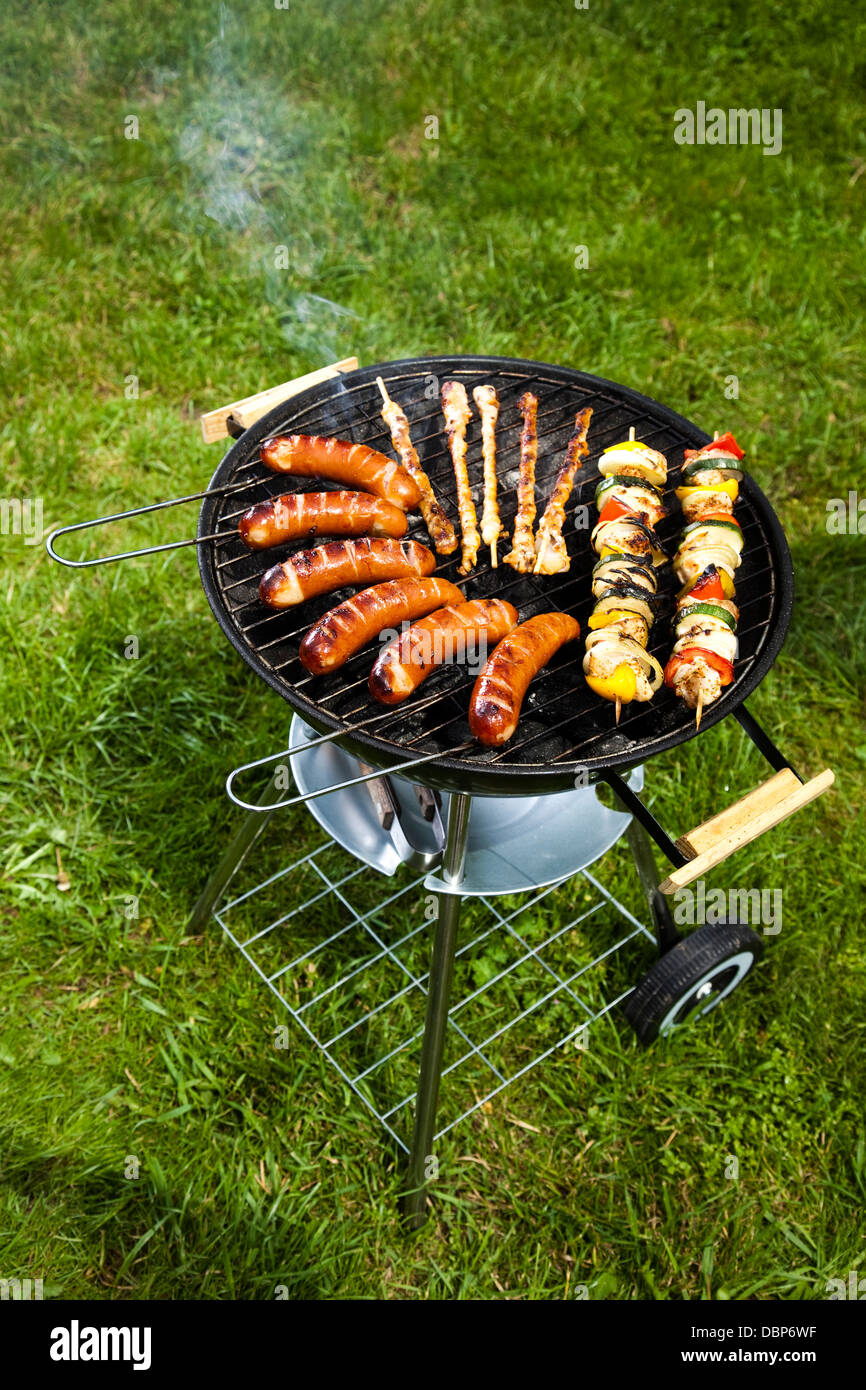 Barbecue a hot summer evening, Grilling Stock Photo - Alamy