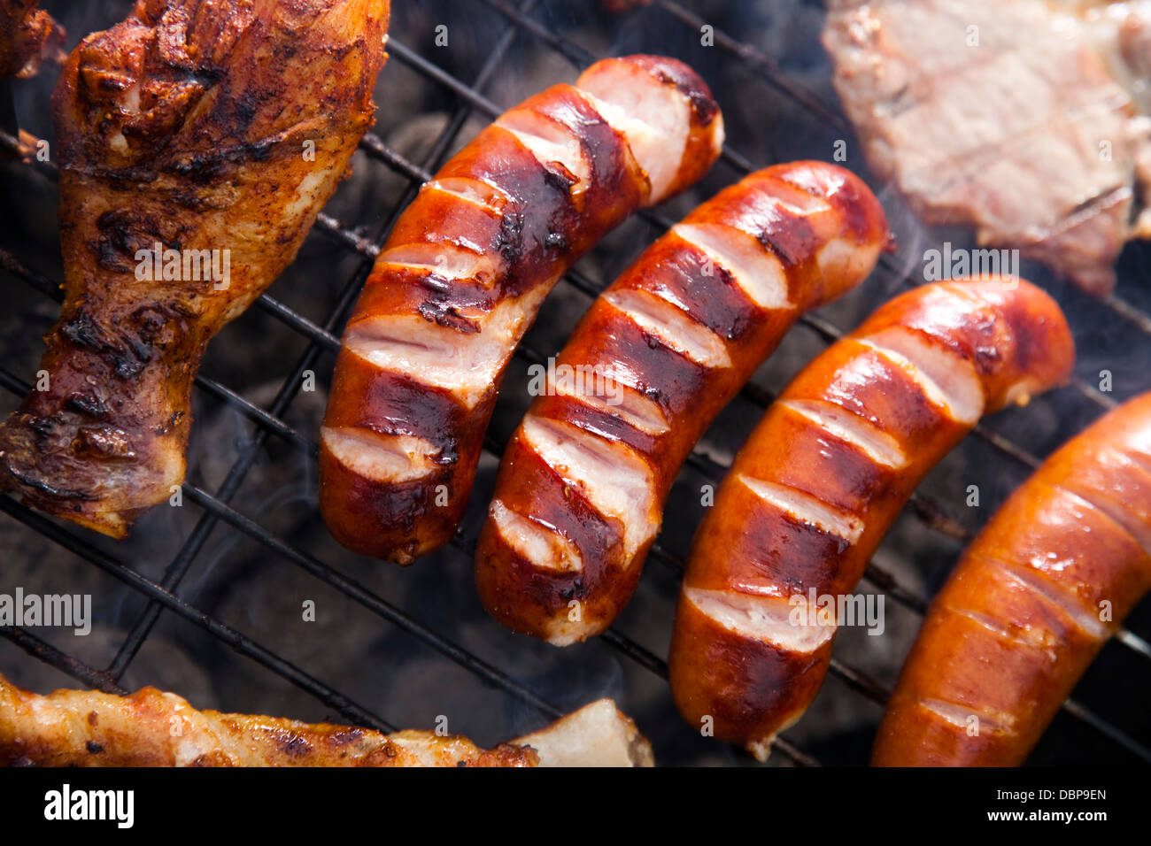 Closeup of meat on grill Stock Photo - Alamy
