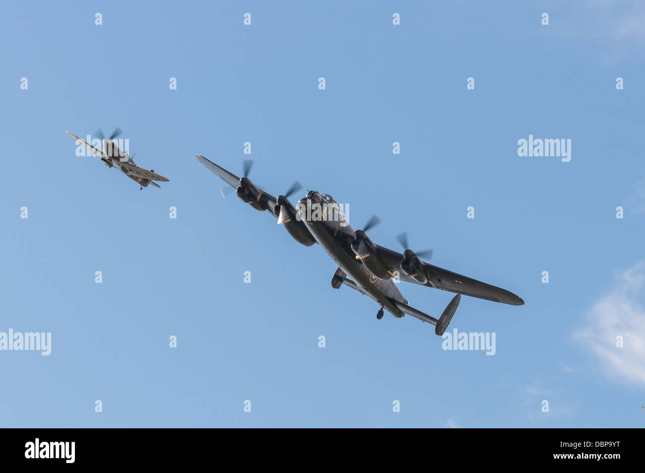 Lancaster bomber and Spitfire flypast in close formation at the ...