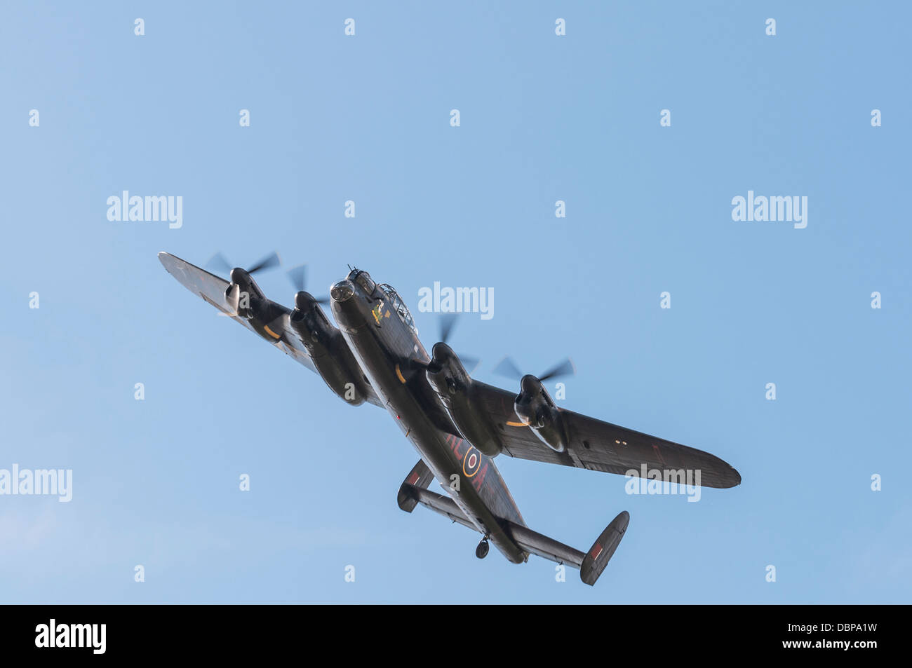 Lancaster Bomber flypast at the Goodwood Revival 2012 Stock Photo - Alamy