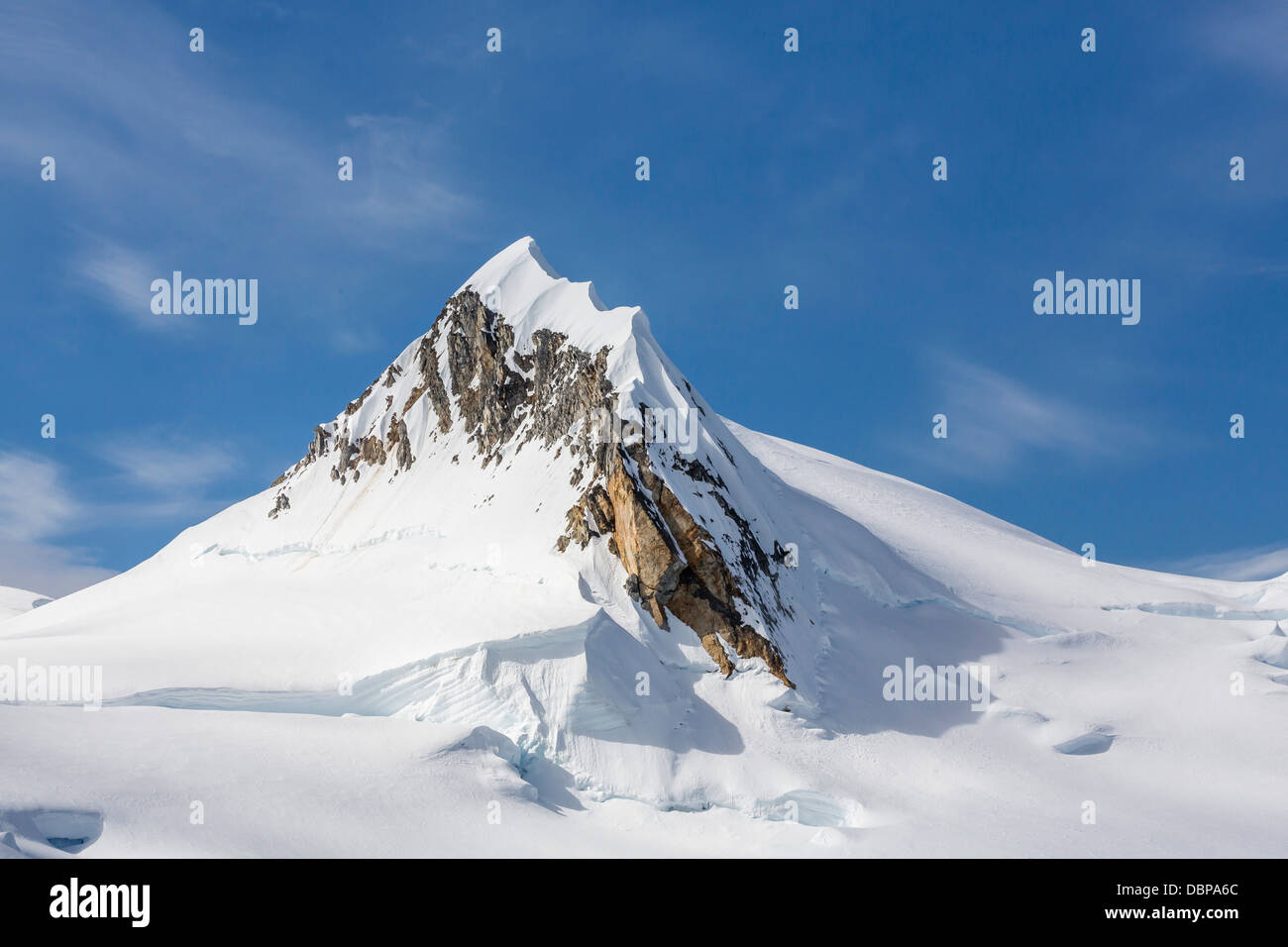 Snow-capped mountains surround Snow Island, South Shetland Islands ...