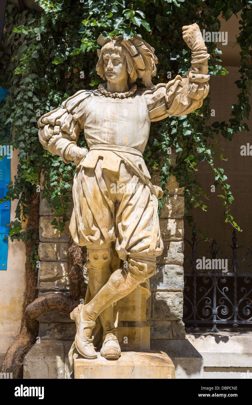 Medieval knight statue in the interior courtyard of Peles castle ...