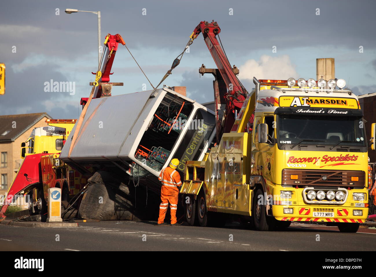 Around 30 people have been injured after a double-decker bus overturned ...