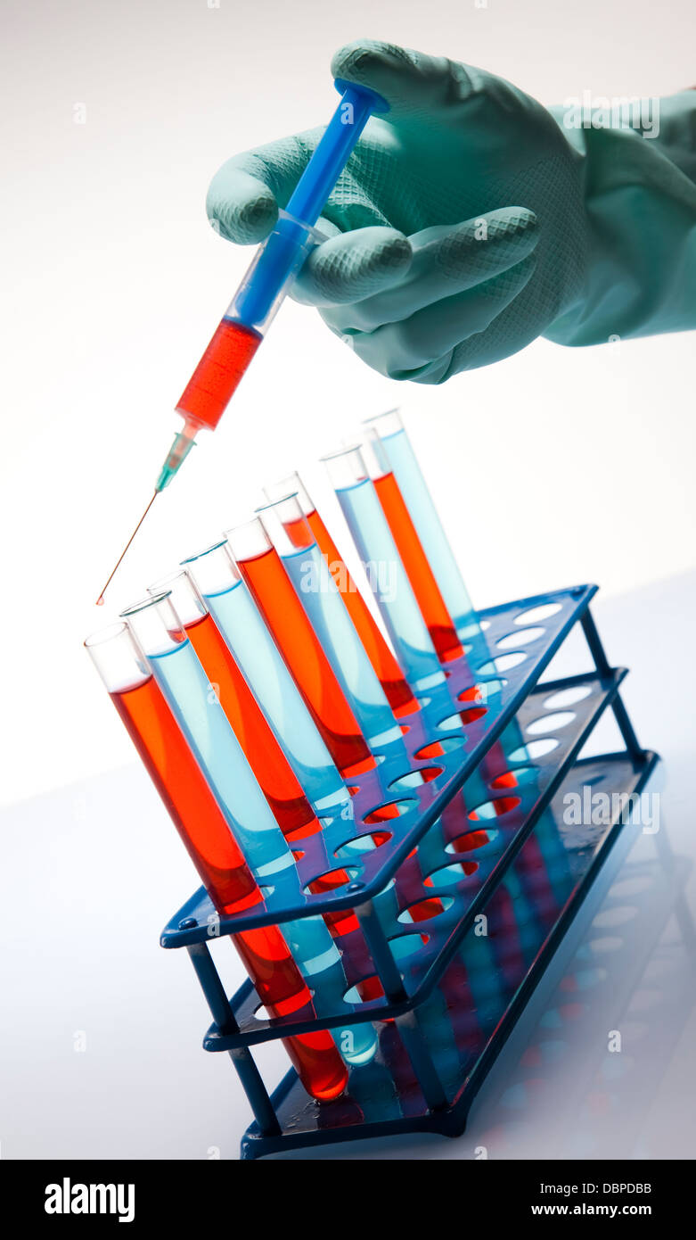 Assorted laboratory glassware , experiment Stock Photo - Alamy