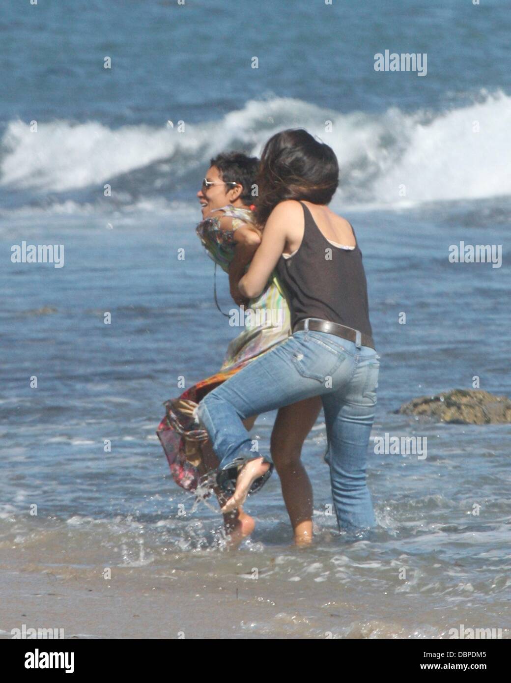 Halle Berry looks in great spirits as she spends her 45th birthday on ...