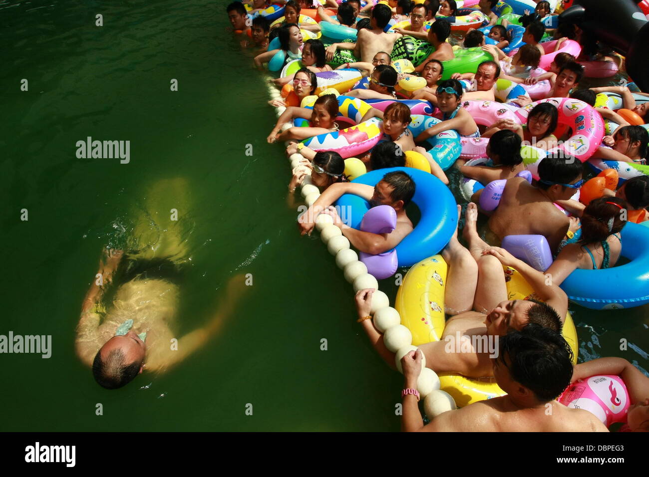 Giant Salty Swimming Pool Hundreds of swimmers gather at a salty ...