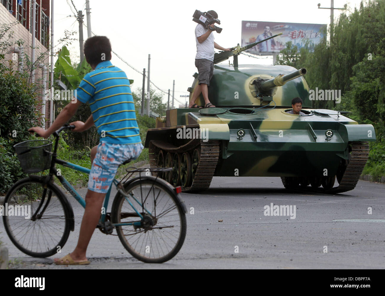 HOMEMADE TANK TAKES TO THE STREETS Residents of Hangzhou, China, may ...
