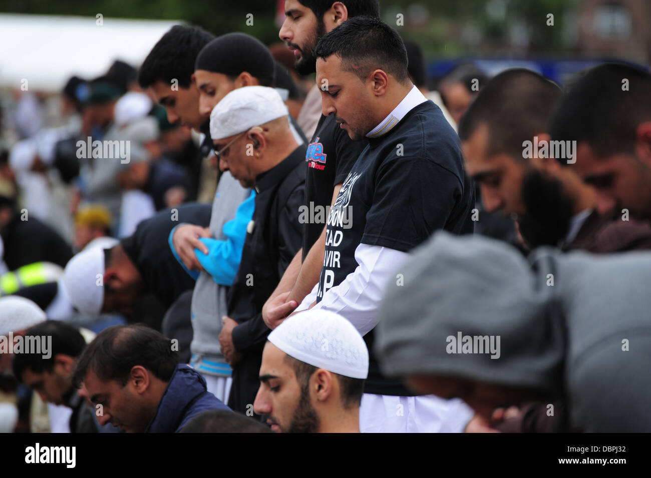 Atmosphere Family and friends are comforted by the hearses during the ...