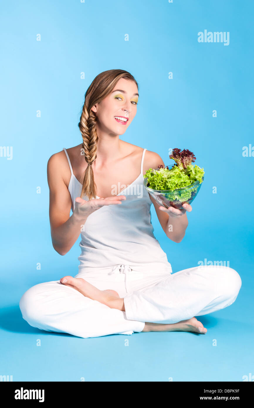 Healthy eating, woman with fresh salad and vegetables Stock Photo - Alamy