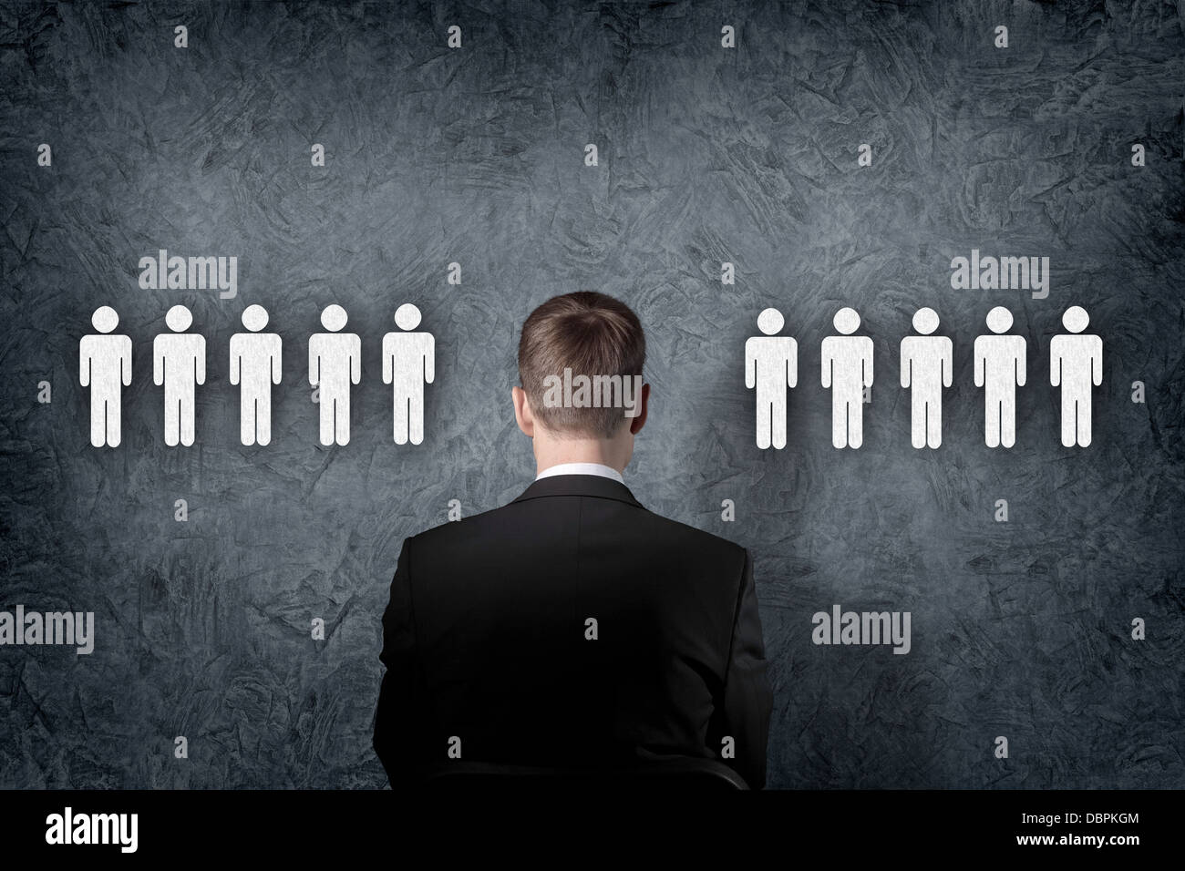 Businessman choosing between people Stock Photo - Alamy