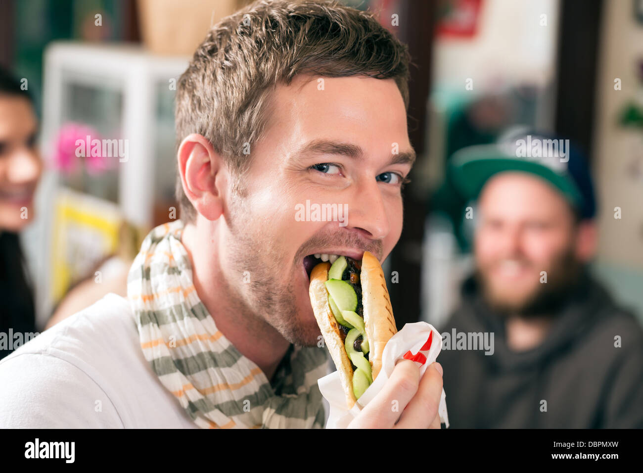 Man eating snack bar not woman hi-res stock photography and images - Alamy