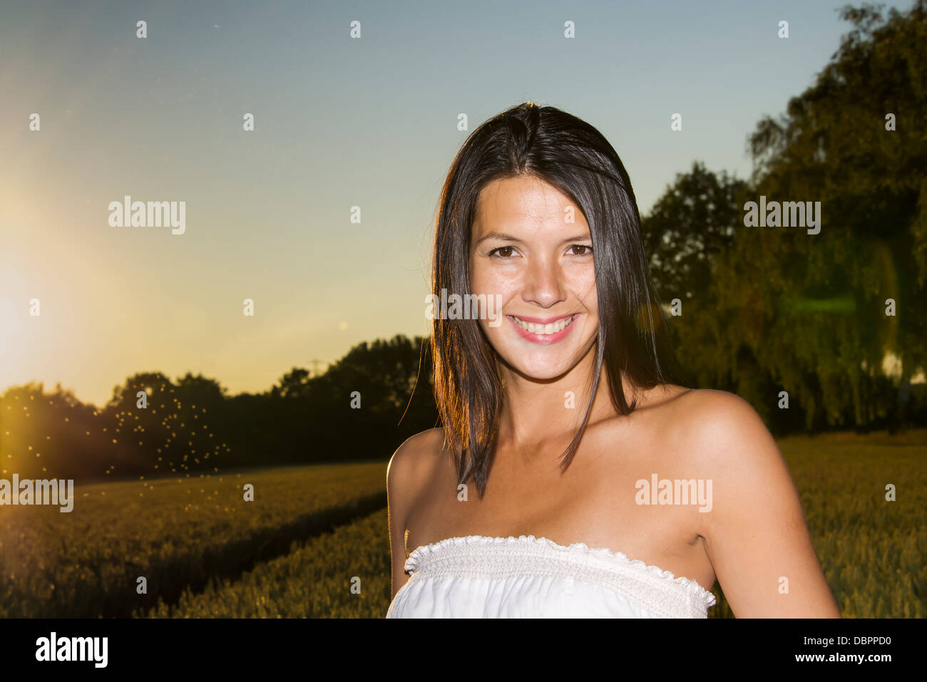 Pensive smile woman nature hi-res stock photography and images - Alamy