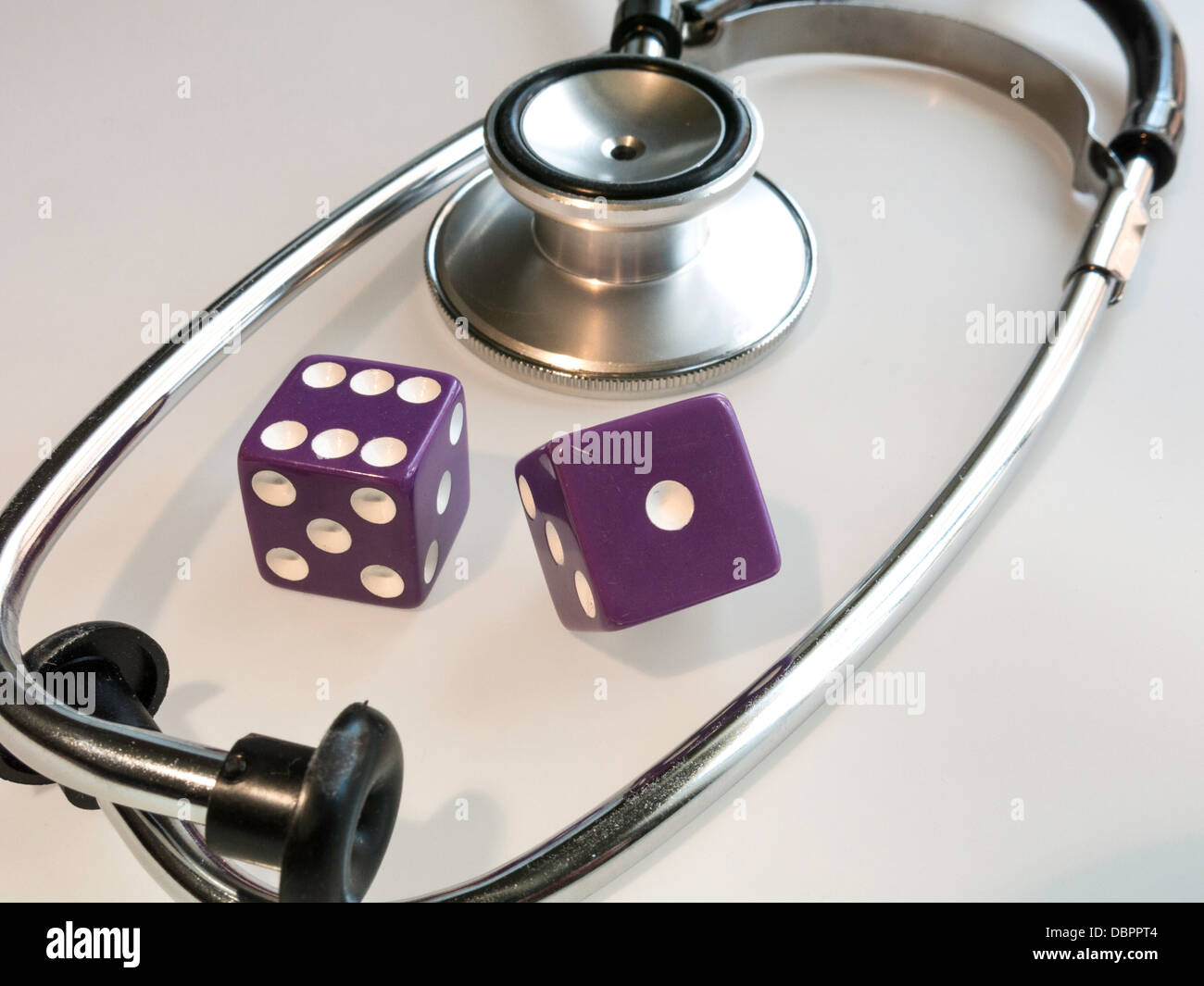 Still Life of Dice and Stethoscope, USA Stock Photo - Alamy