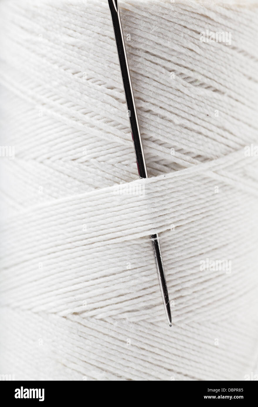 White spool of thread hi-res stock photography and images - Alamy