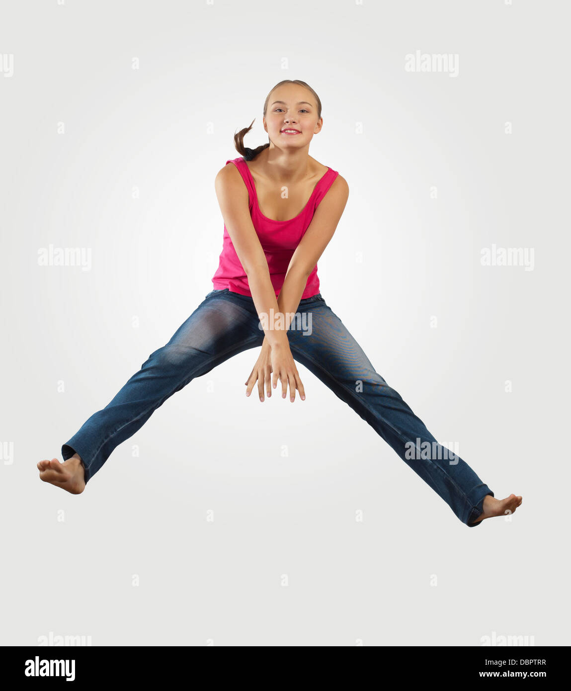young woman playing on electro guitar and jumping Stock Photo - Alamy