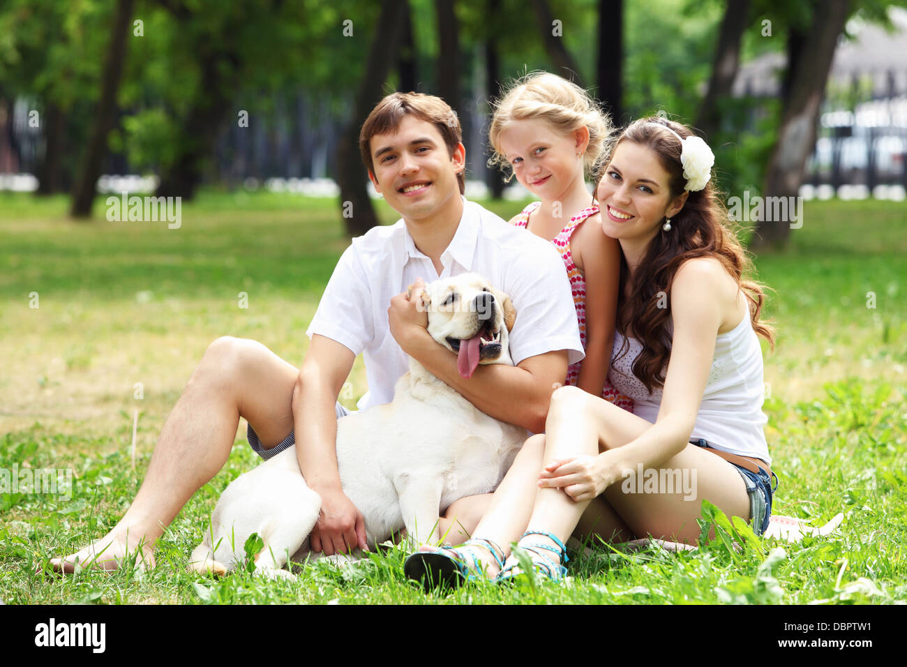 Happy family having fun outdoors Stock Photo - Alamy