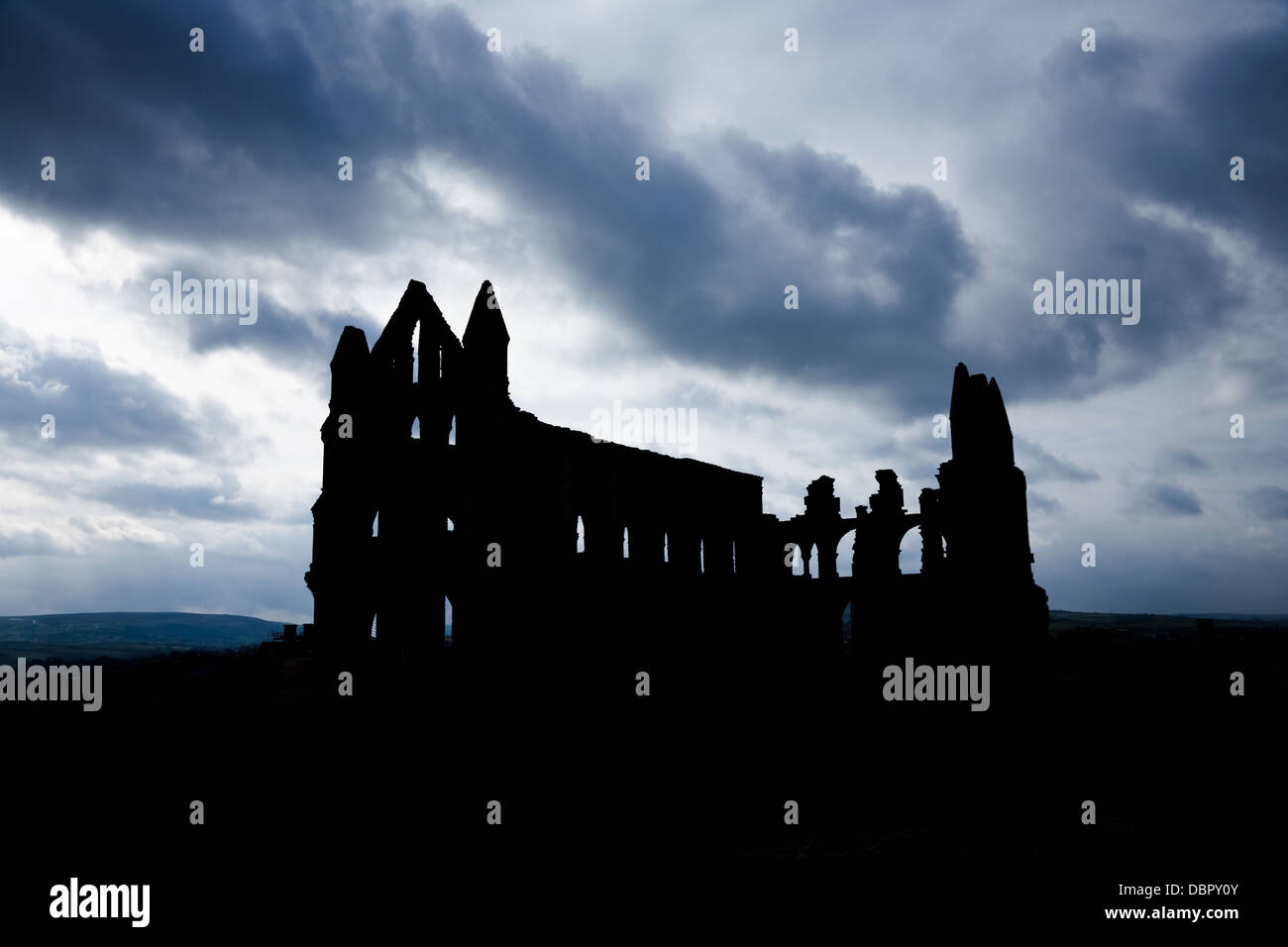 Silhouette of the ruins of the abbey in Whitby, North Yorkshire, UK ...