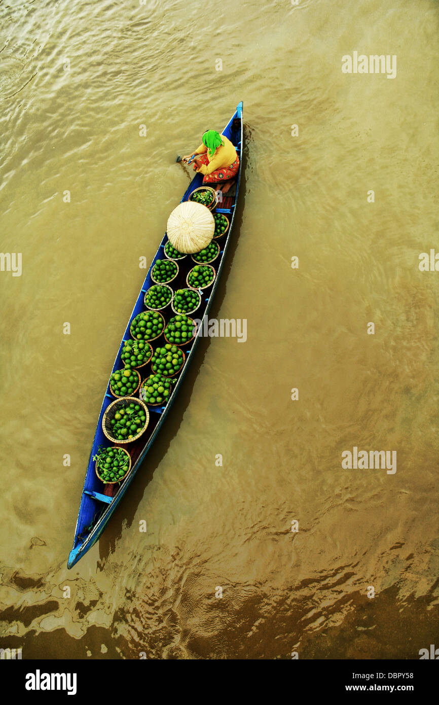 Villager going to Floating Market with traditional boat Stock Photo - Alamy