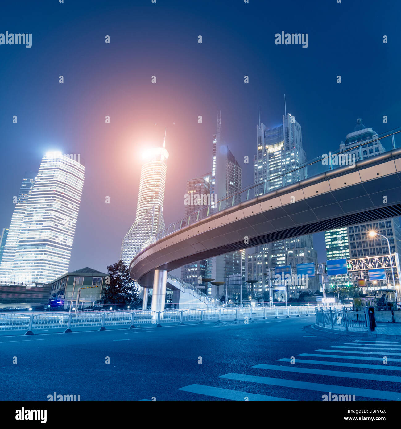 light trails on the street with modern building background in shanghai ...