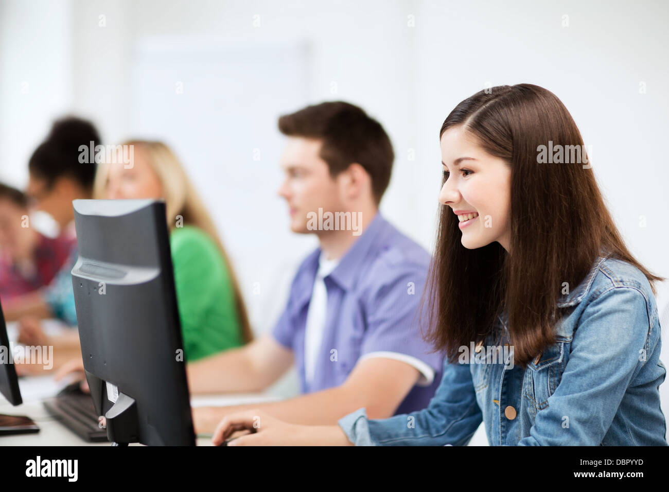 students with computers studying at school Stock Photo - Alamy