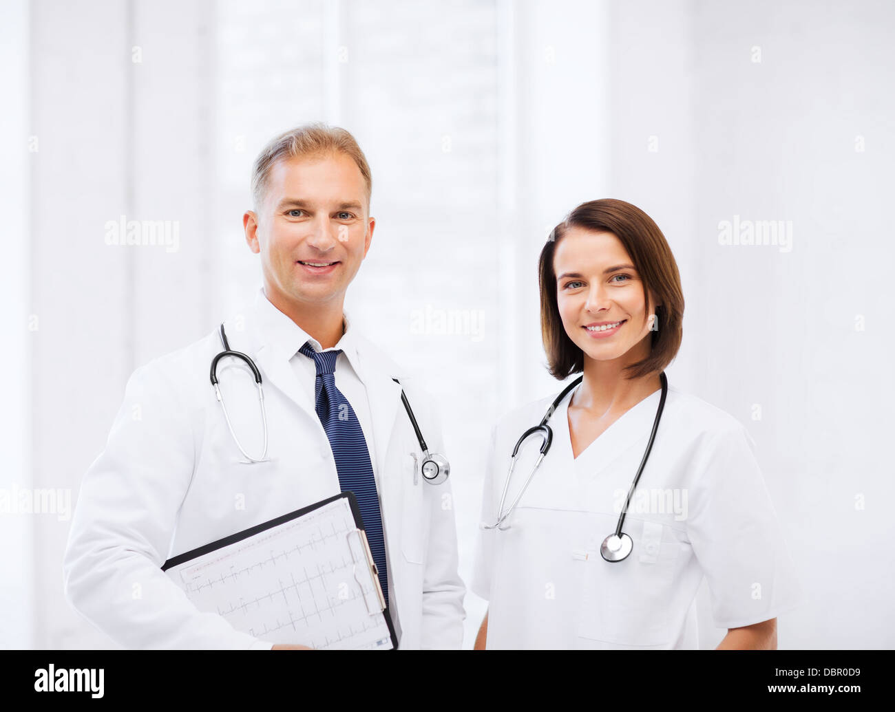 two doctors with stethoscopes Stock Photo - Alamy