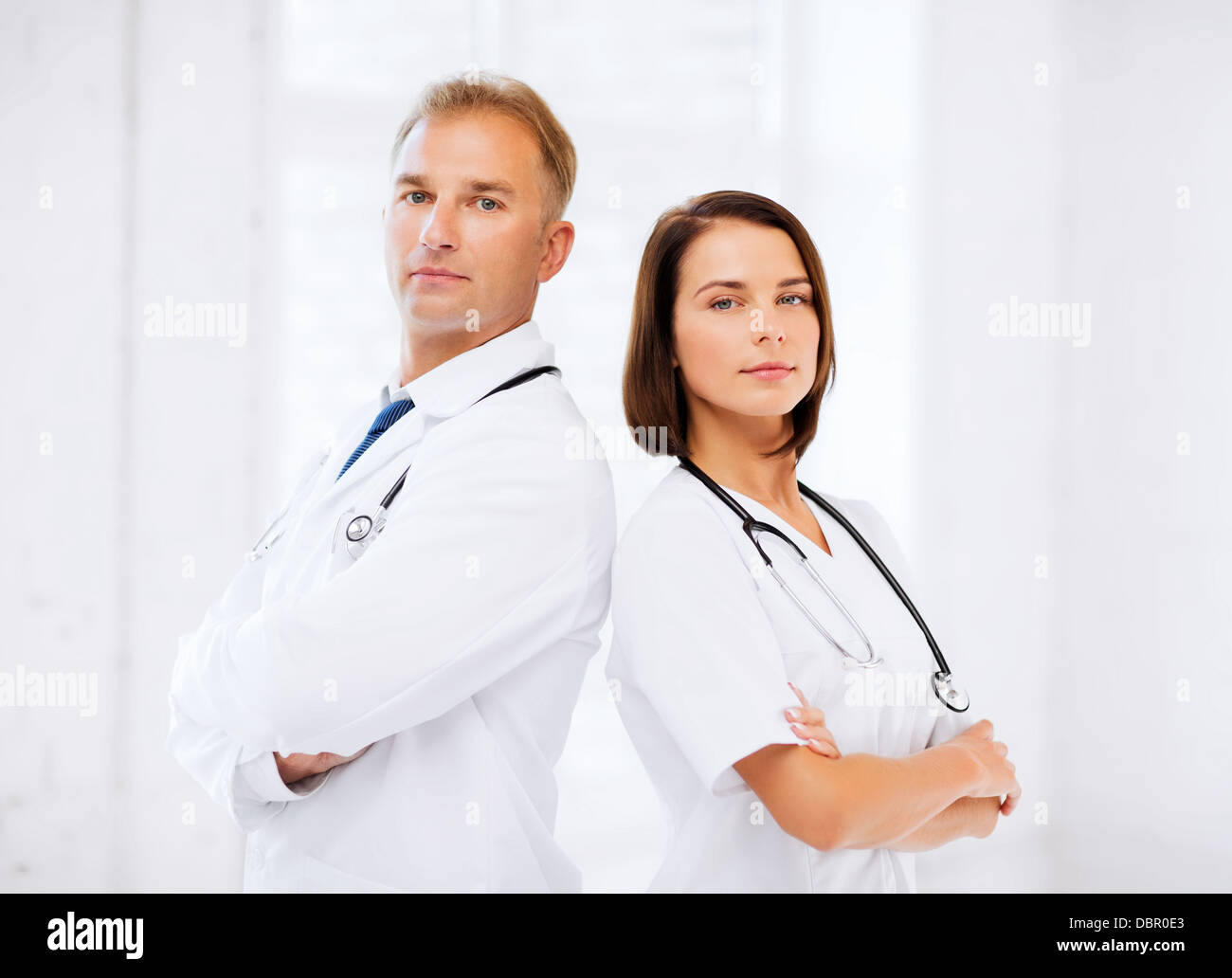 two doctors with stethoscopes Stock Photo - Alamy