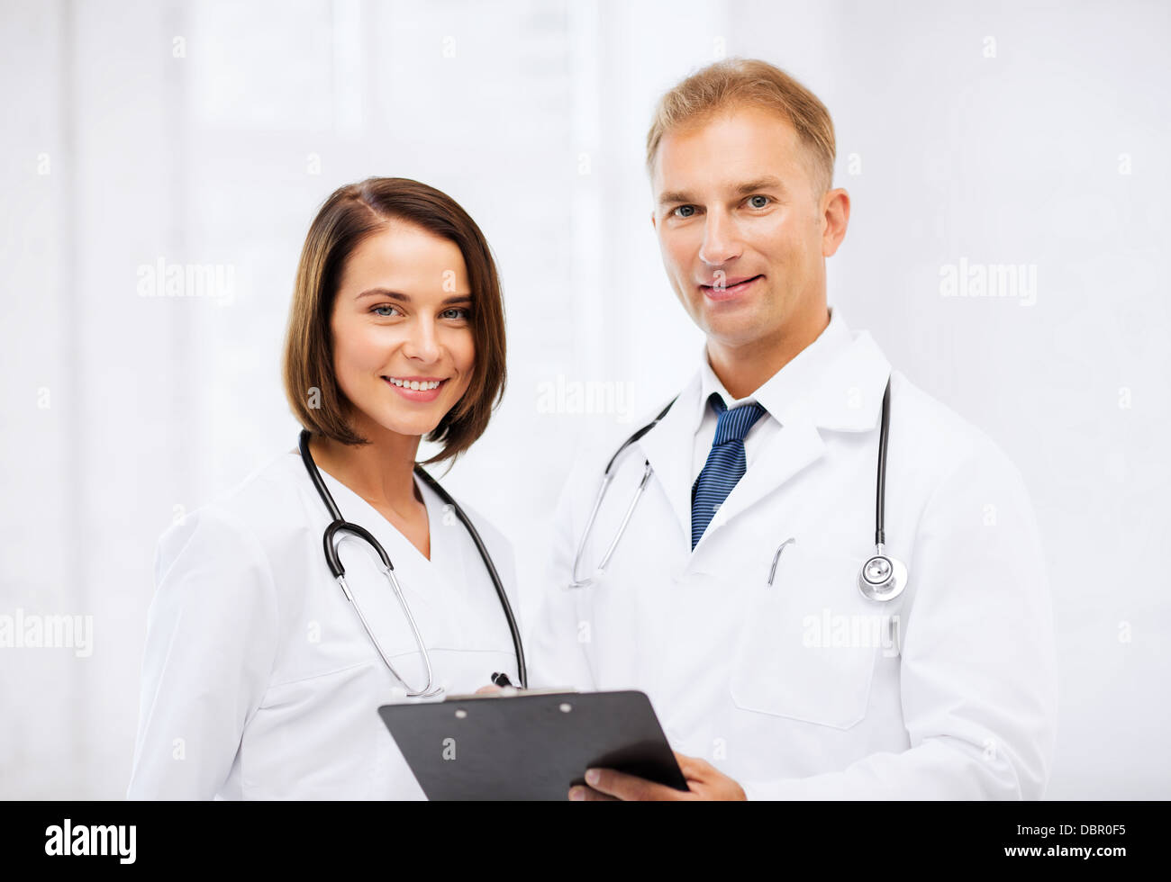 two doctors with stethoscopes Stock Photo - Alamy
