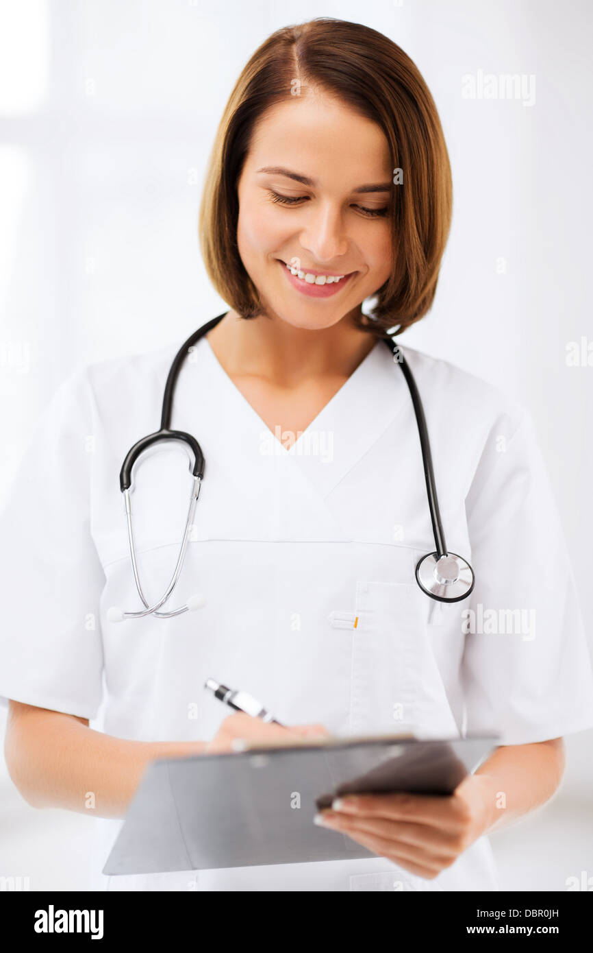 female doctor with stethoscope and clipboard Stock Photo - Alamy