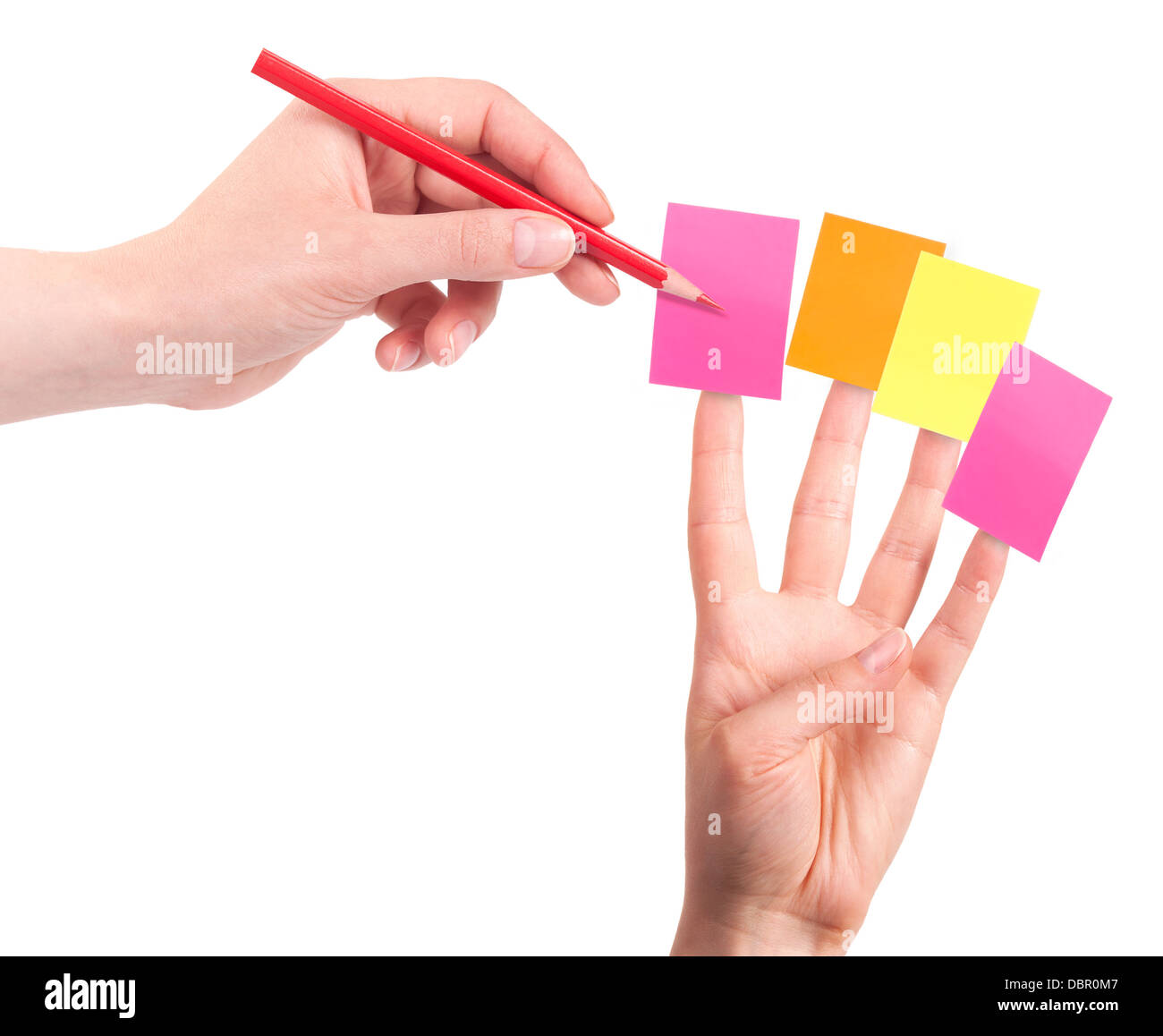 primary goals planning strategy concept - woman's finger with note and ...