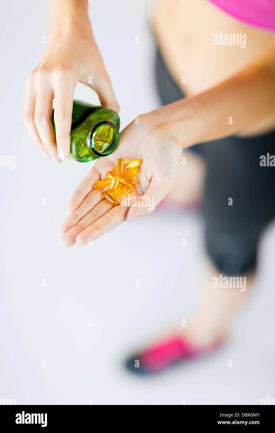 woman hand with capsules Stock Photo - Alamy