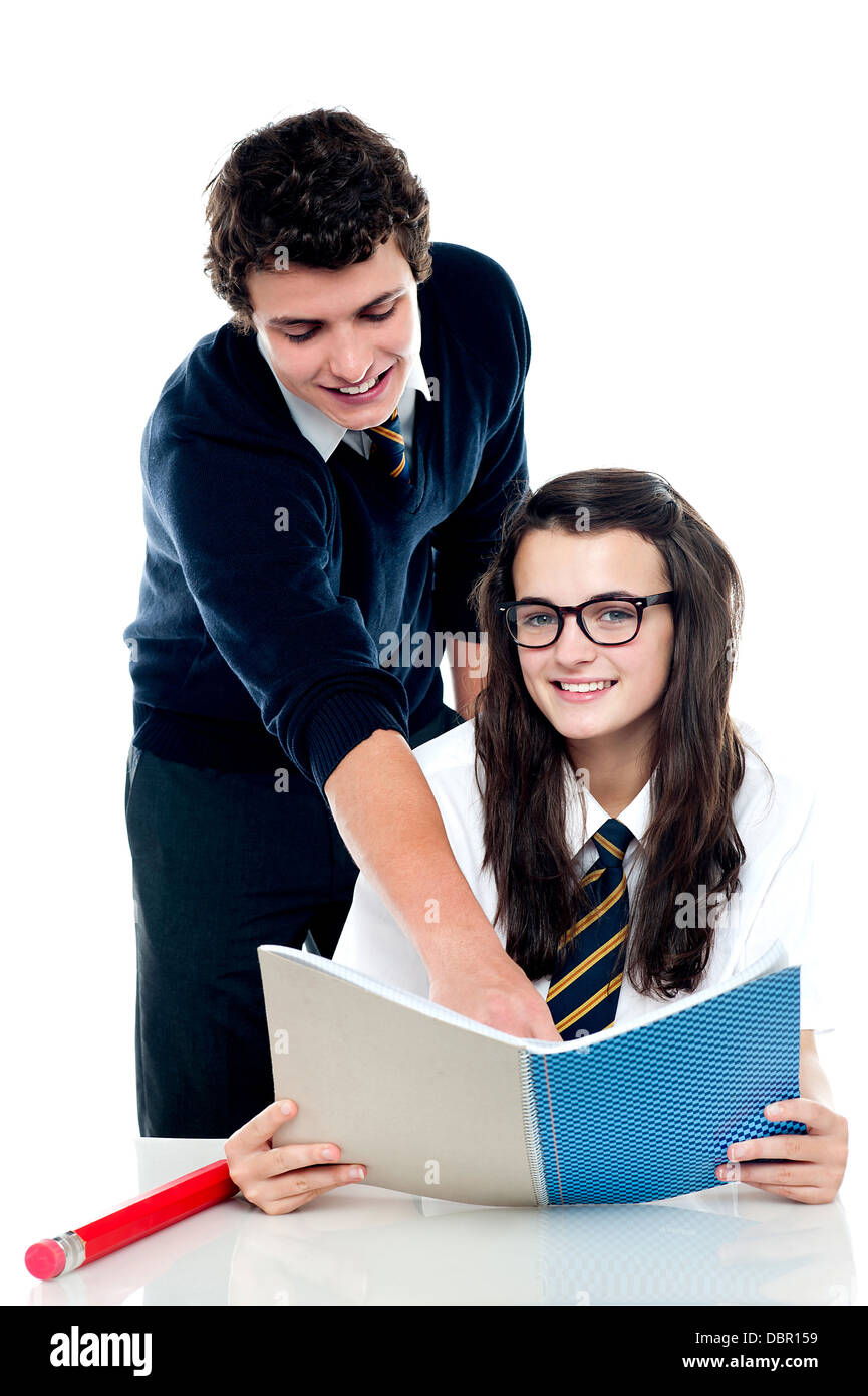 Young boy helping his friend and guiding Stock Photo - Alamy
