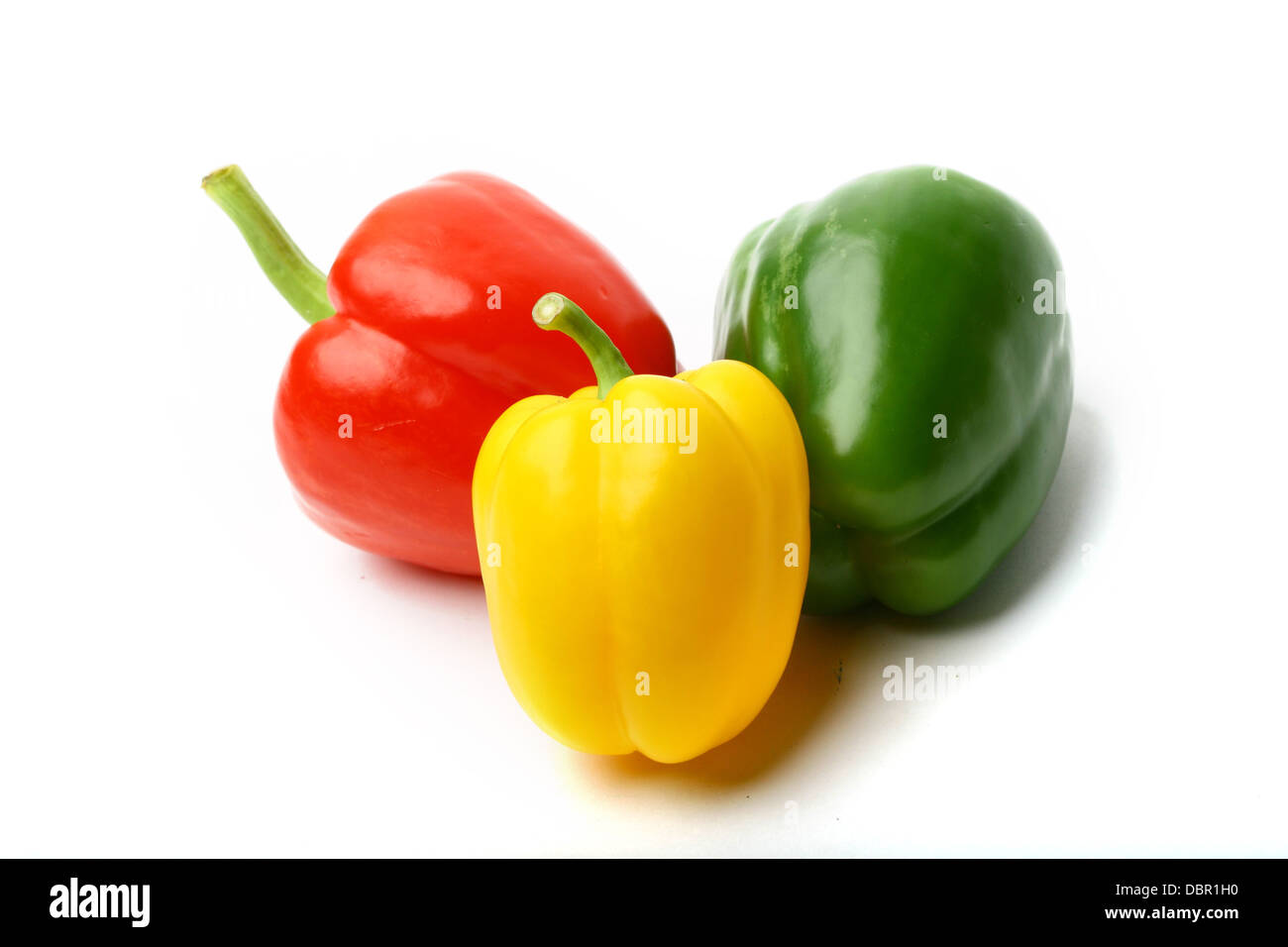 colored paprica isolated on white background Stock Photo - Alamy