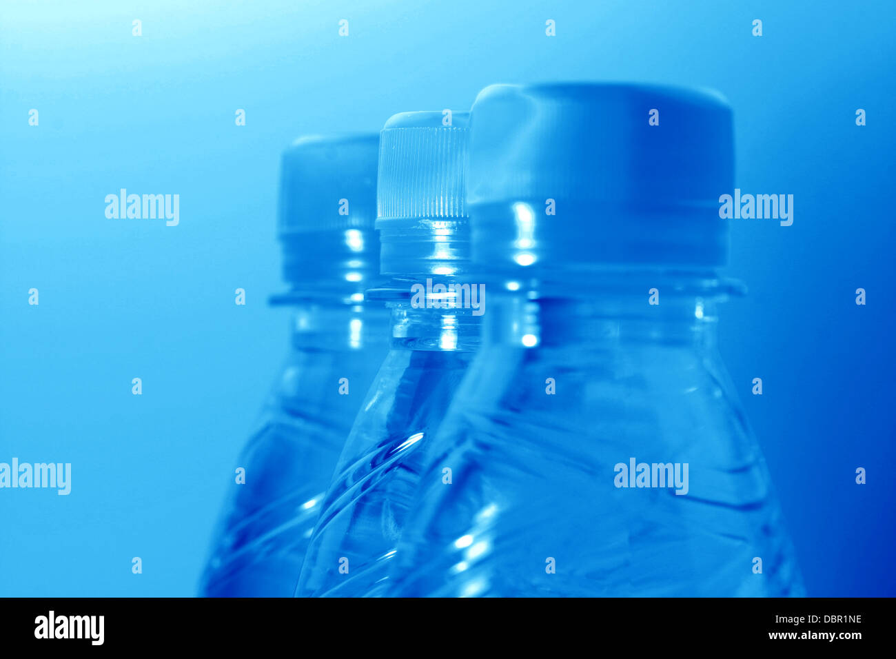 clear cold blue water in bottle Stock Photo - Alamy