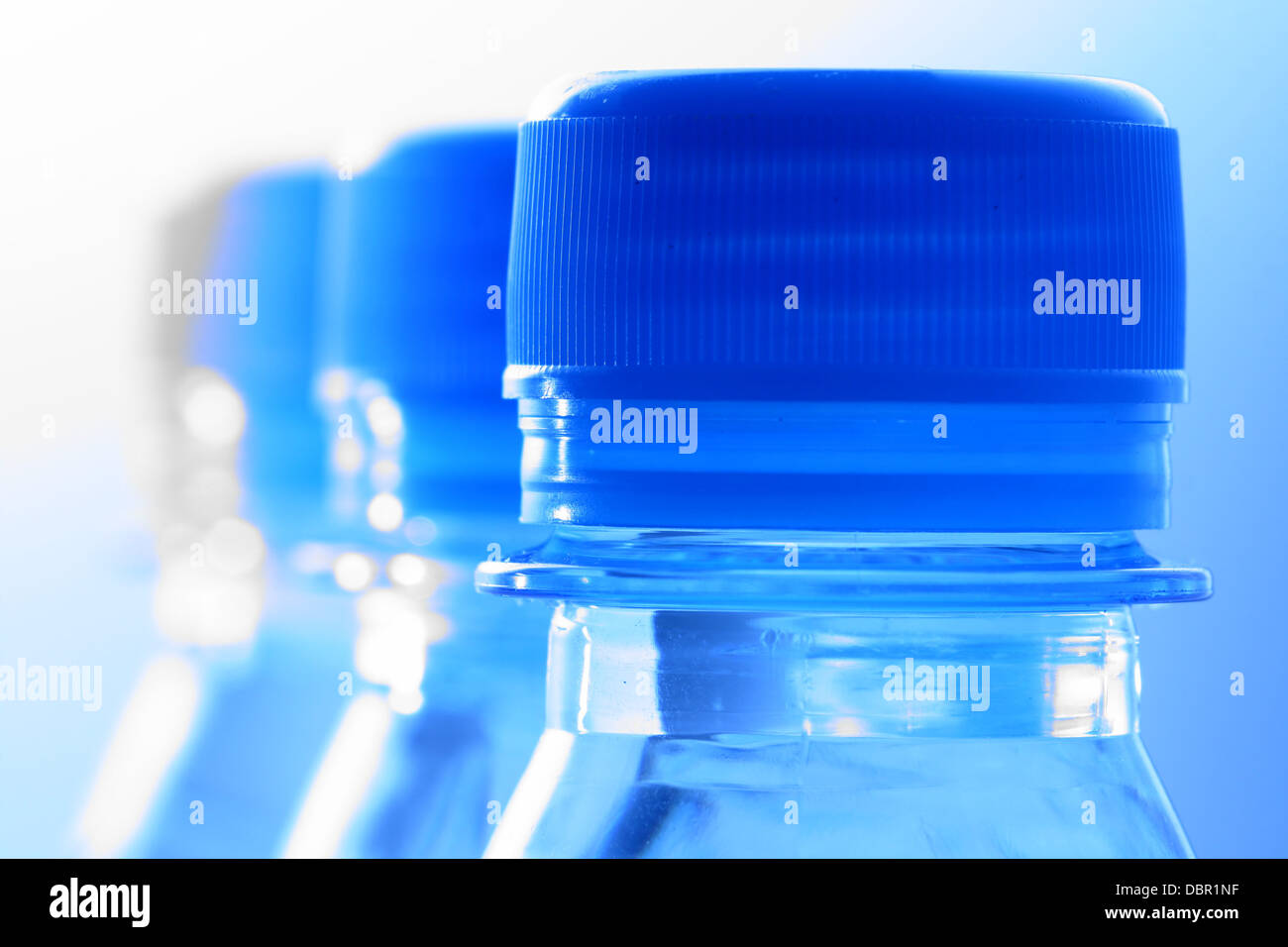 clear cold blue water in bottle Stock Photo - Alamy