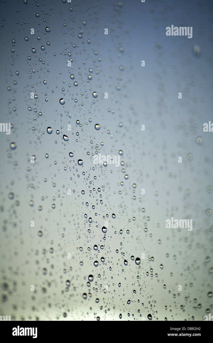 Water droplets from the rain on a window Stock Photo - Alamy