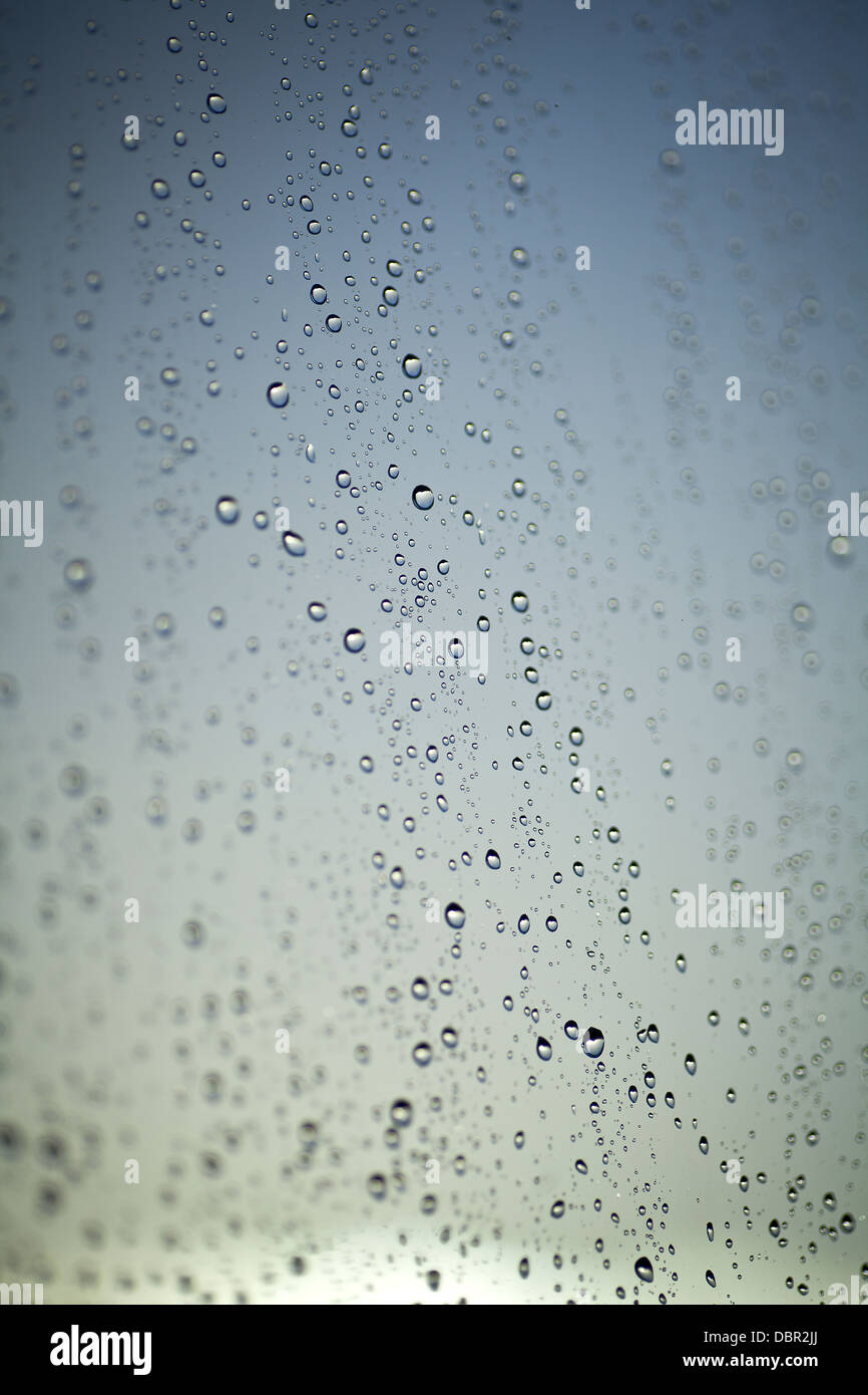 Water droplets from the rain on a window Stock Photo - Alamy