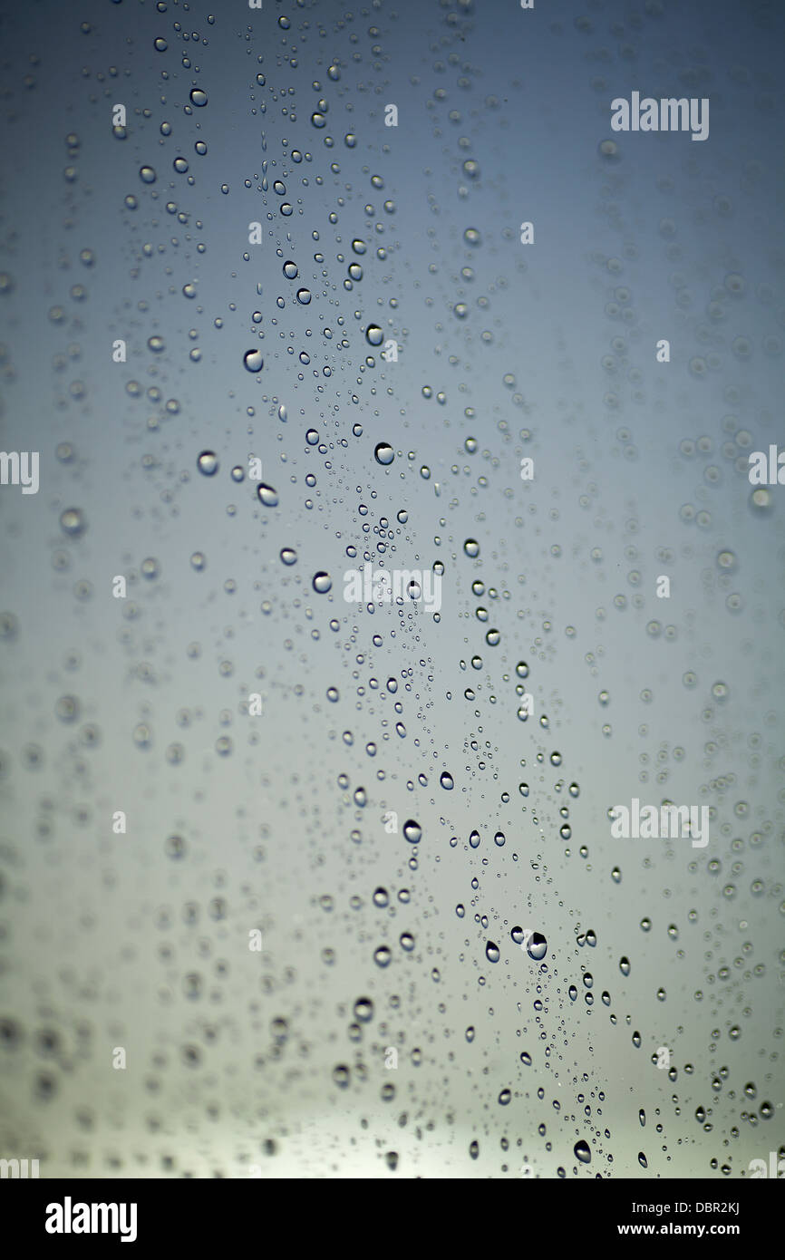Water droplets from the rain on a window Stock Photo - Alamy