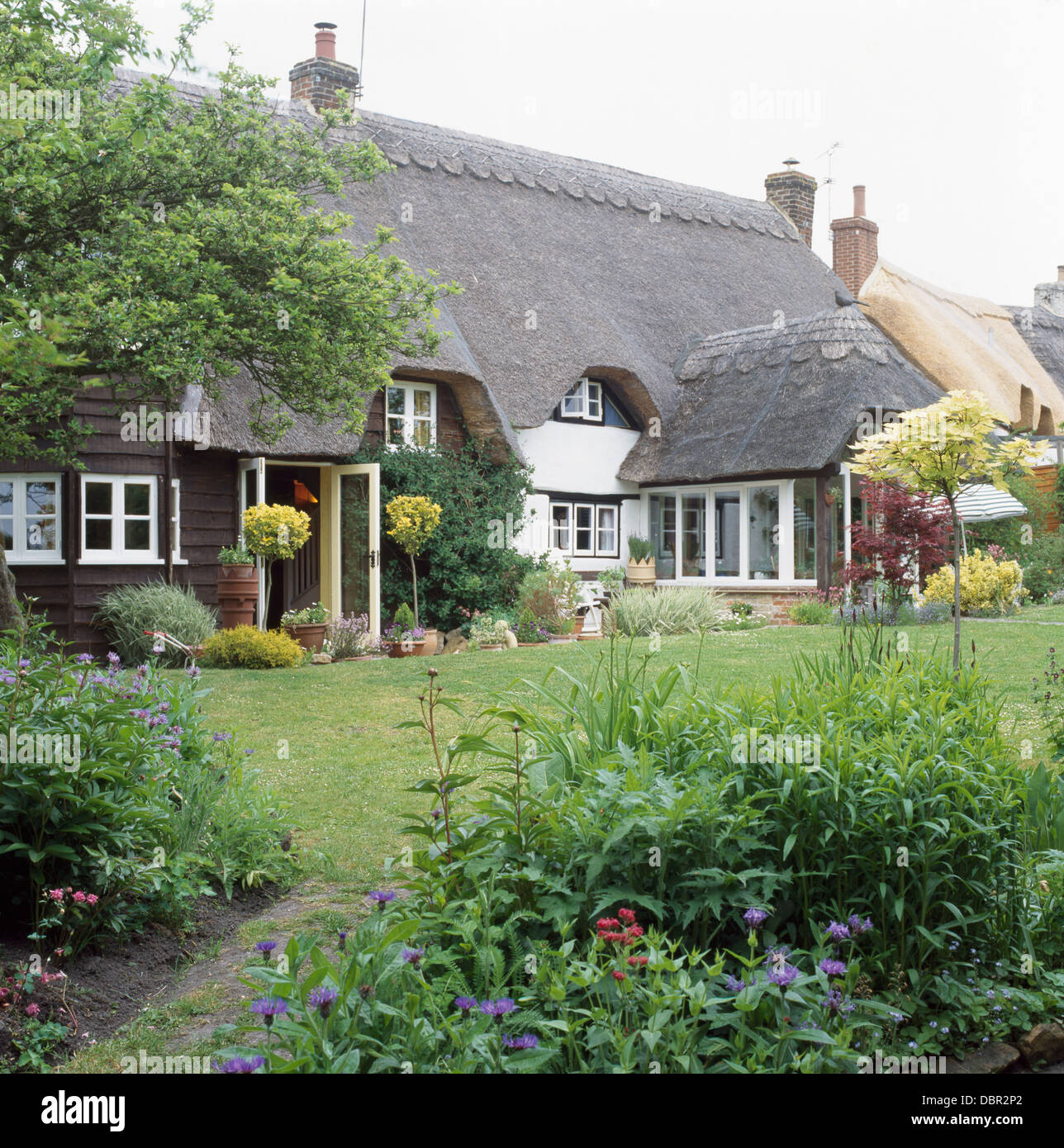 Exteriors traditional cottage extension hi-res stock photography and ...