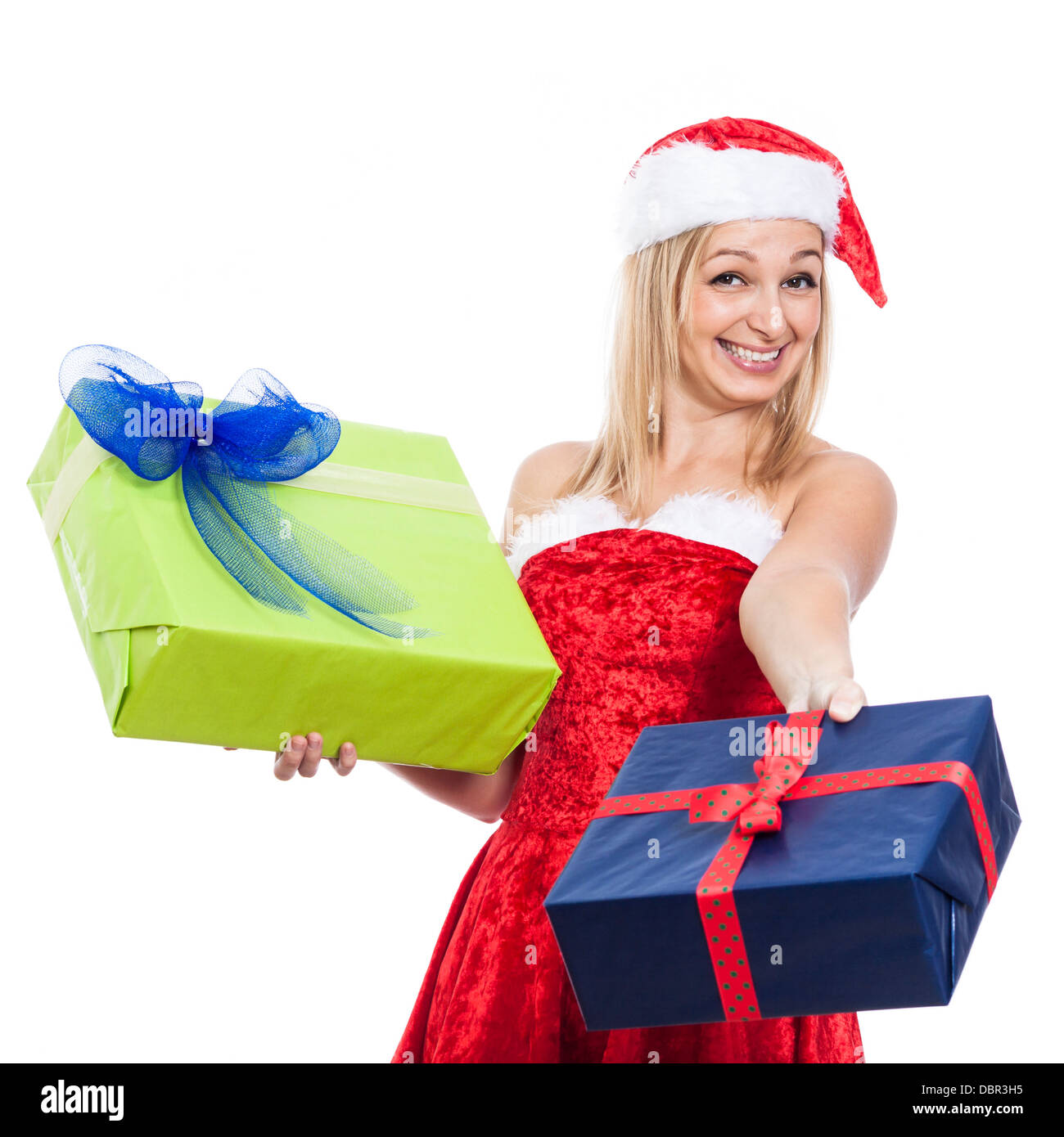 Ecstatic generous Christmas woman giving presents, isolated on white ...