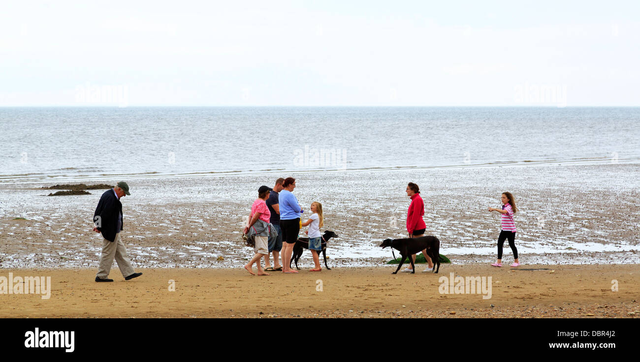 People and dogs walking on Hunstanton beach, Norfolk, England Stock ...