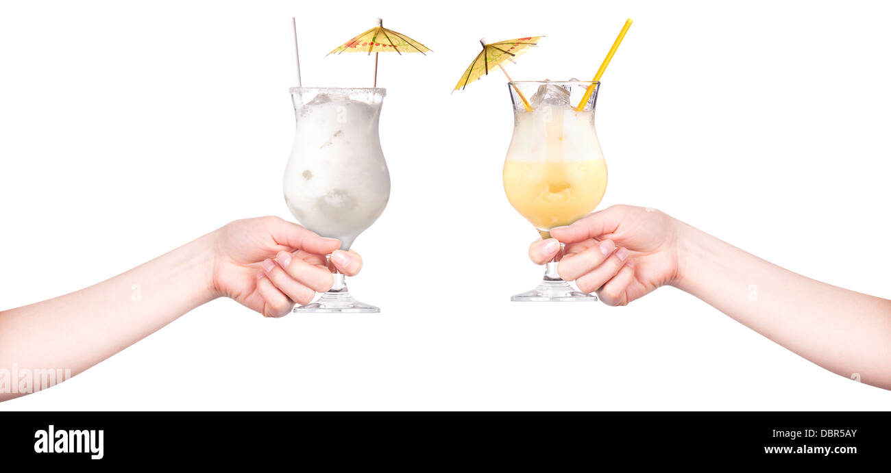 hand with alcohol cocktail making toast isolated on a white background ...