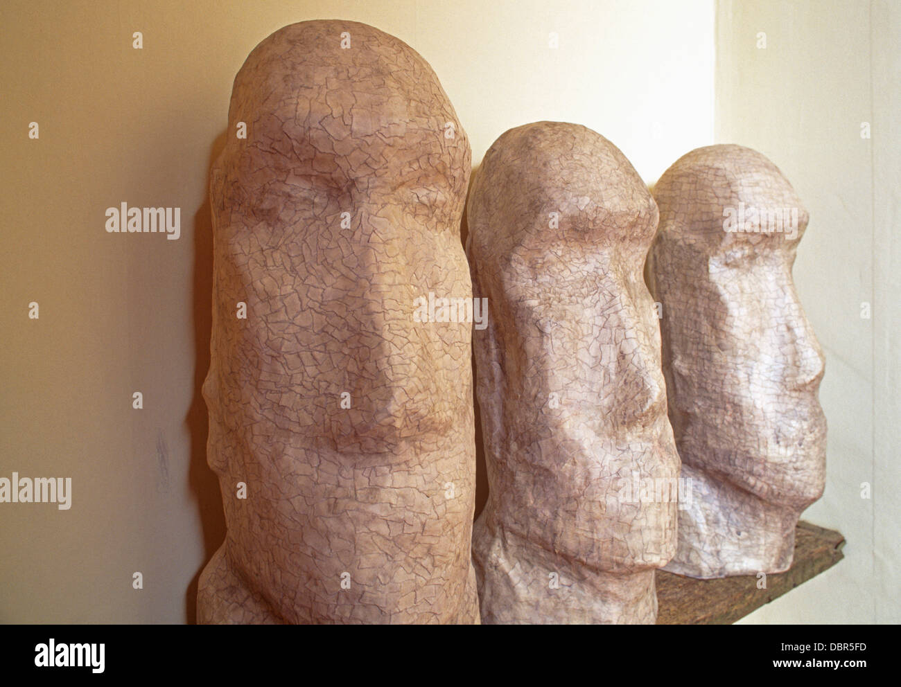 Close-up of Easter Island-style plaster heads Stock Photo - Alamy