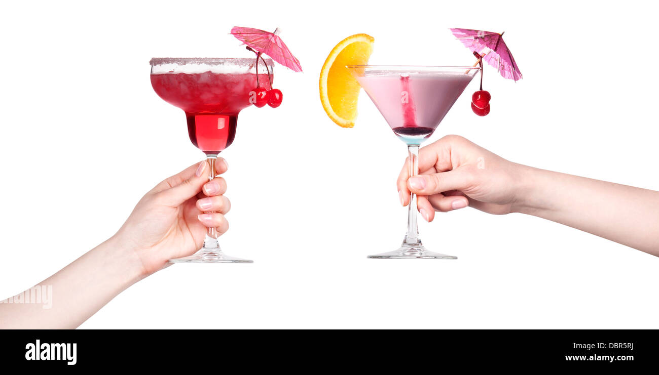 hand with alcohol cocktail making toast isolated on a white background ...